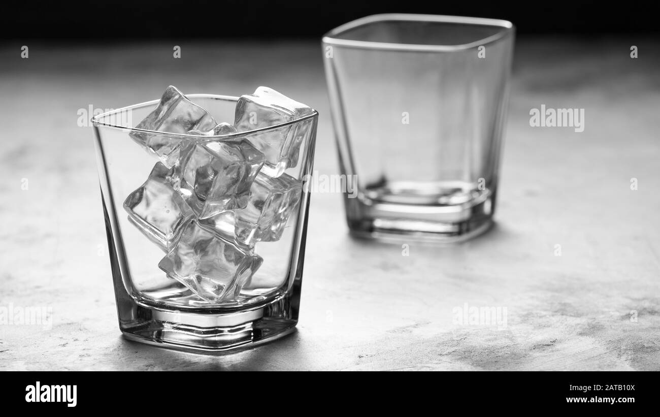 Clean glasses with ice. Cocktails concept Stock Photo - Alamy