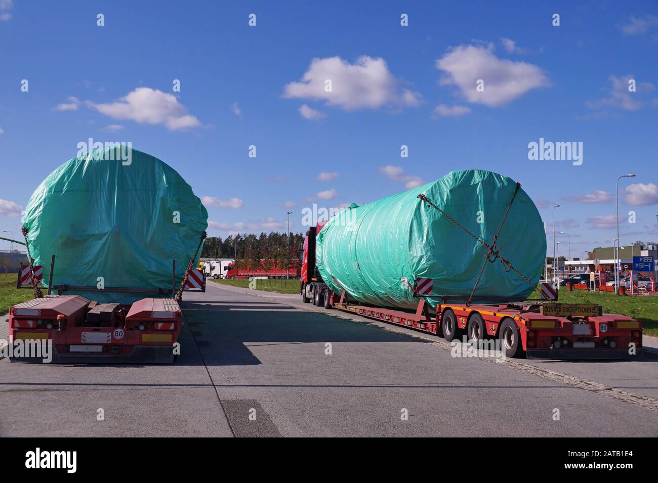 A truck with a special semi-trailer for transporting oversized loads. Oversize Load or ...