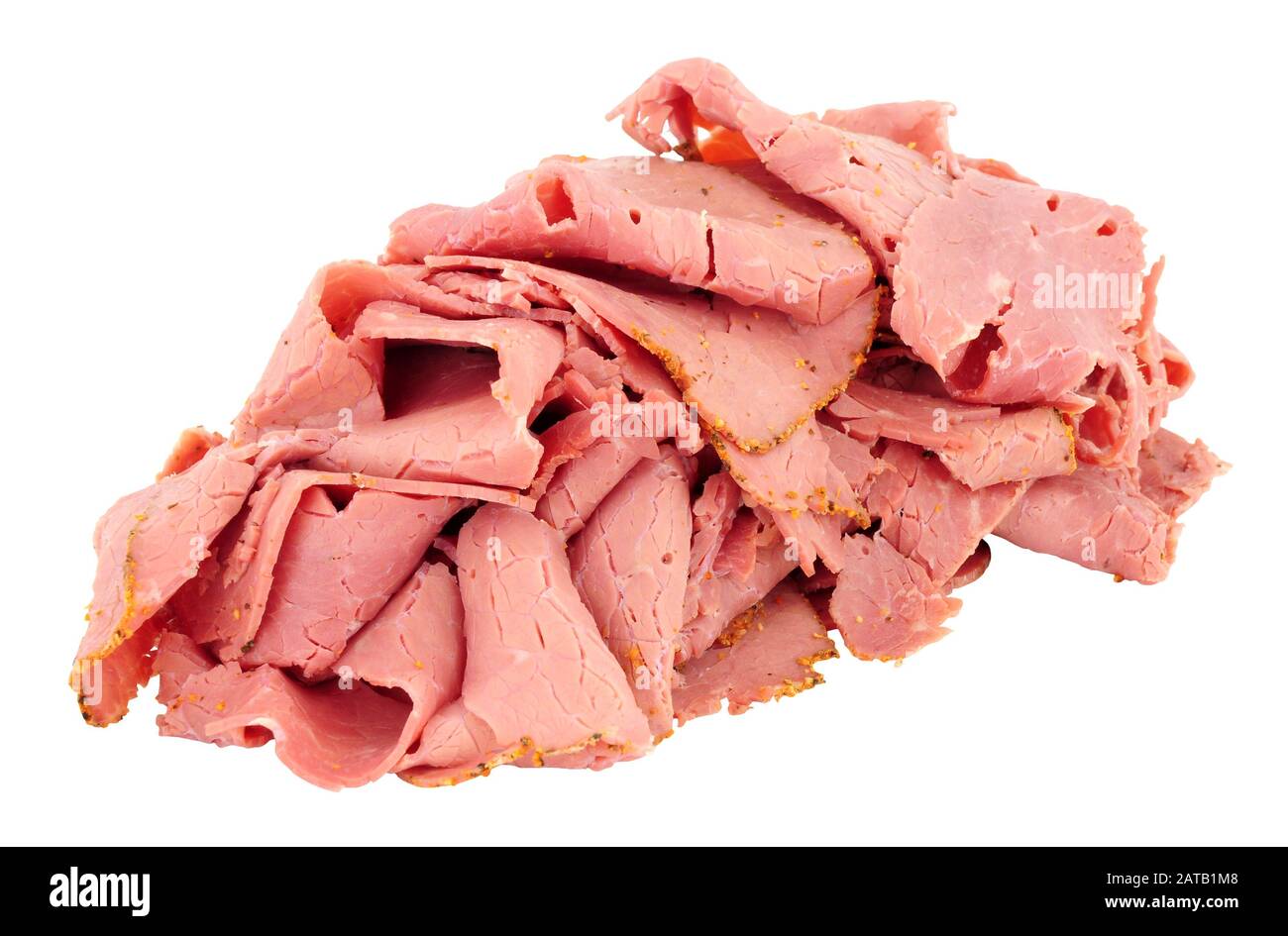 Pile of thinly sliced pastrami meat isolated on a white background ...