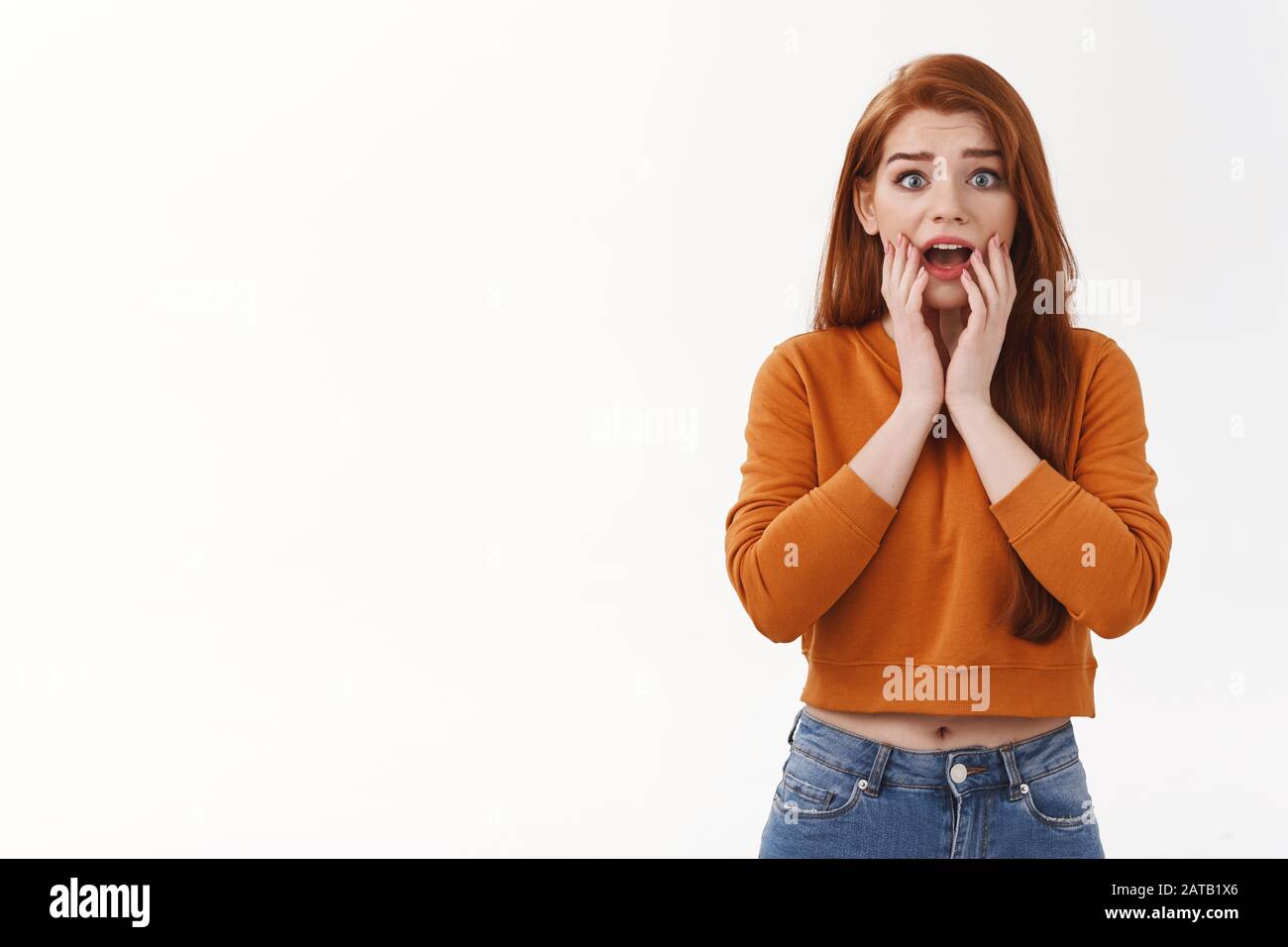 Worried young troubled redhead cute female student dont know what do ...