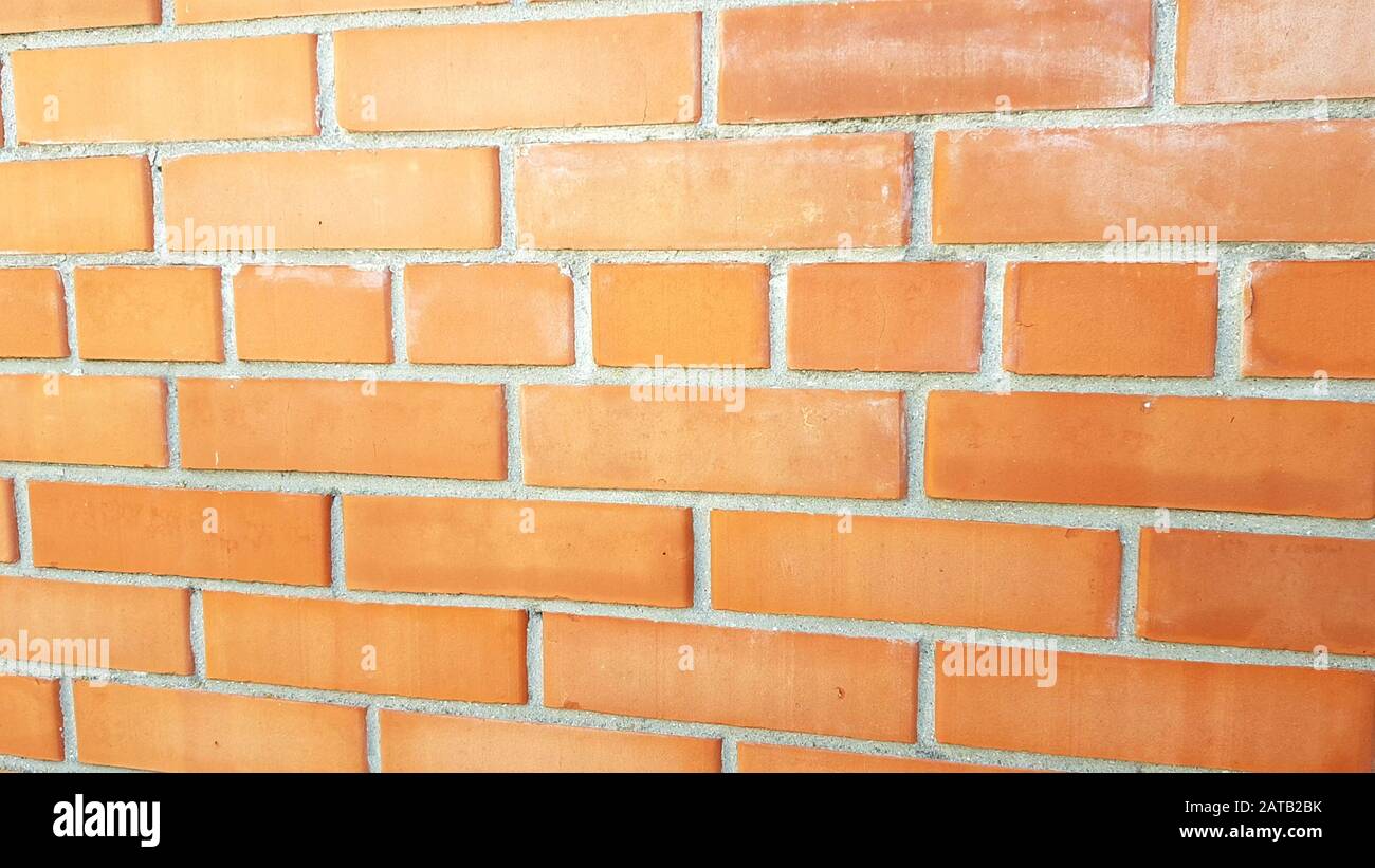 Red brick wall, front view, closeup view Stock Photo - Alamy