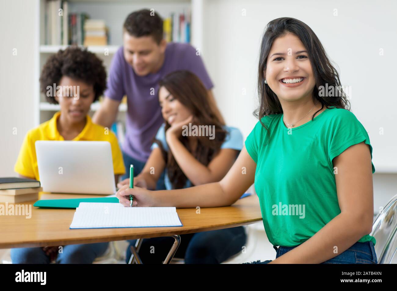 Beautiful female student with group of multi ehtnic students at ...