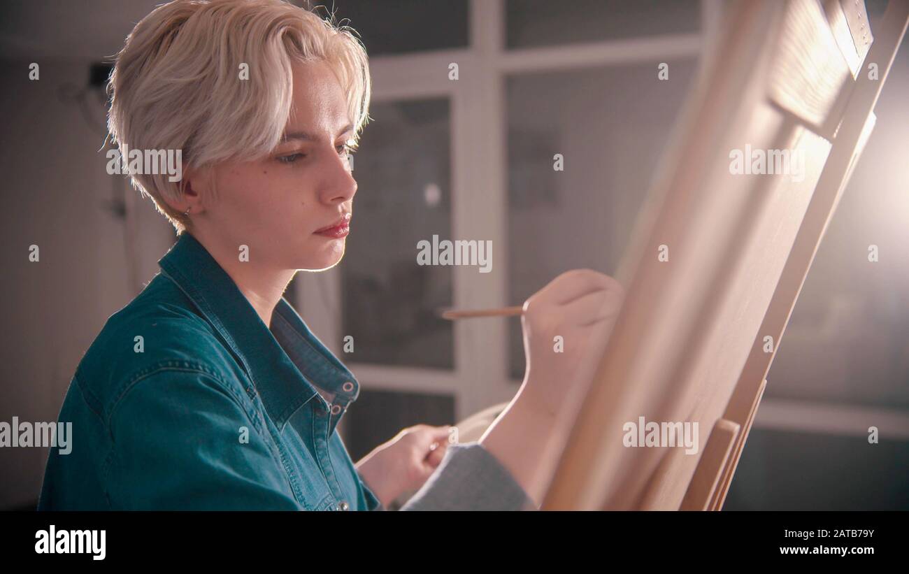 Woman Artist At Work Studio High Resolution Stock Photography and ...