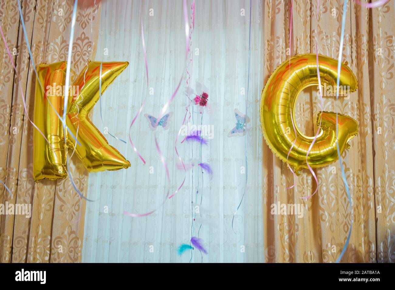 K and G For Best Friends Forever made of golden inflatable balloon ...