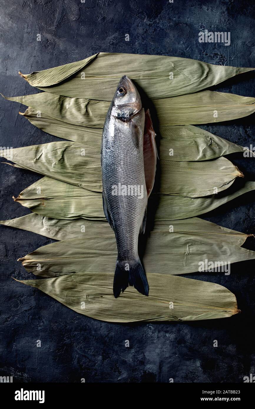 Raw uncooked fish sea bass Stock Photo - Alamy