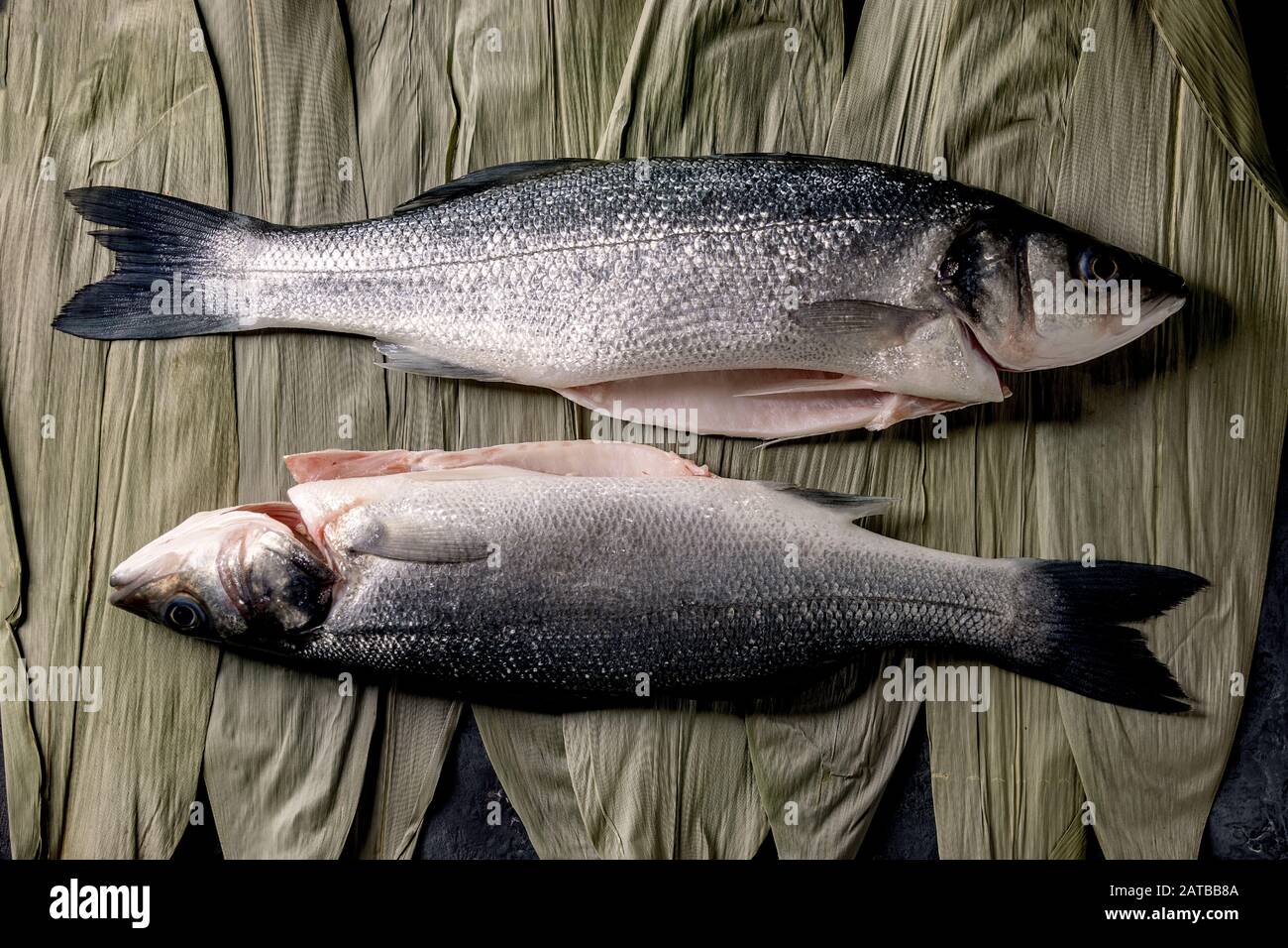 Raw uncooked fish sea bass Stock Photo - Alamy