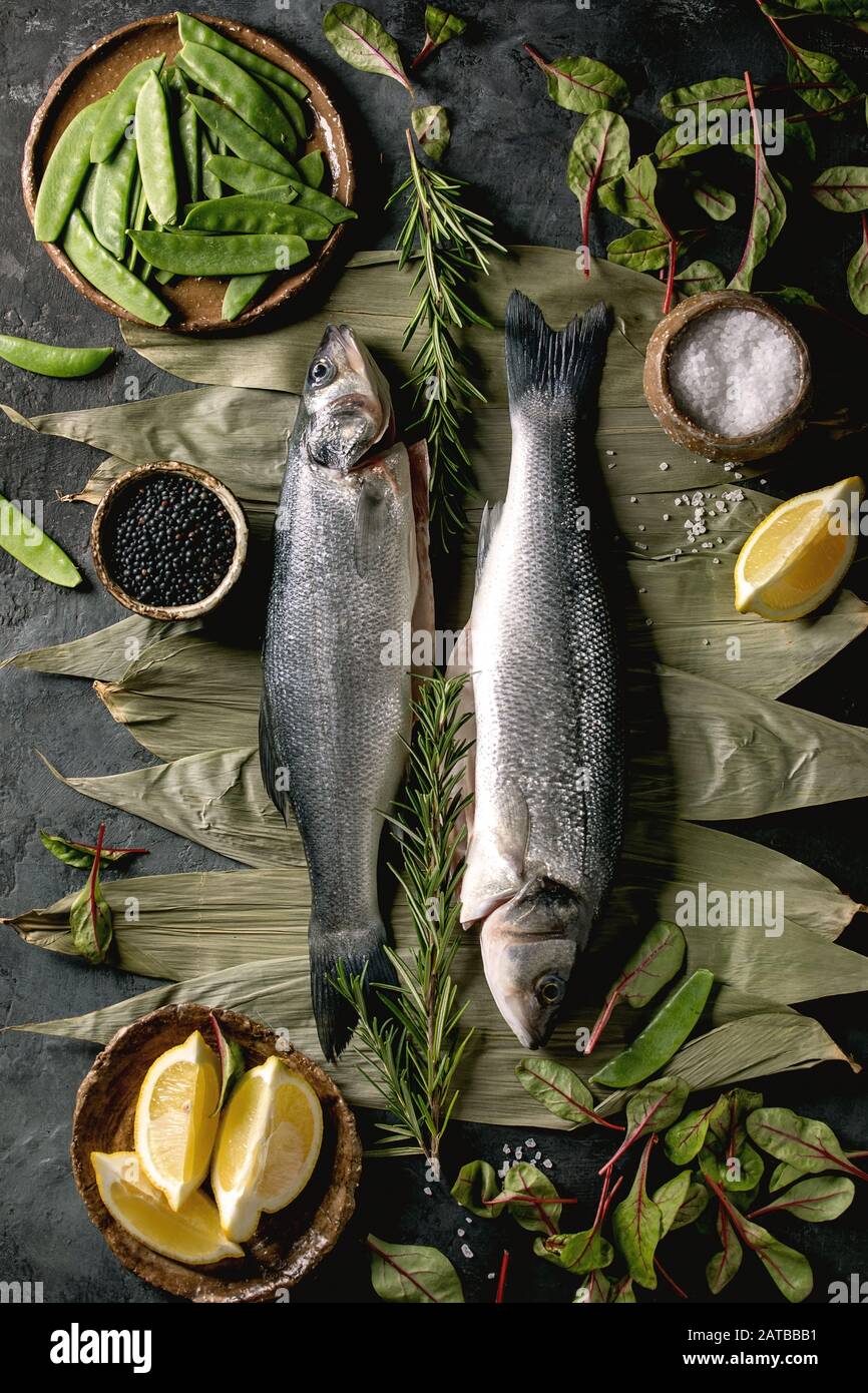 Raw uncooked fish sea bass Stock Photo - Alamy