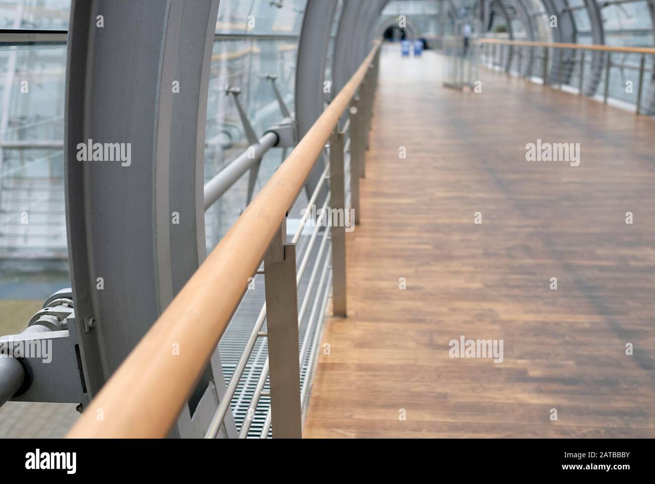 Empty hallway with wooden railing and wooden floor Stock Photo - Alamy