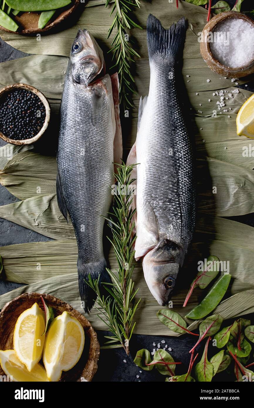 Raw uncooked fish sea bass Stock Photo - Alamy