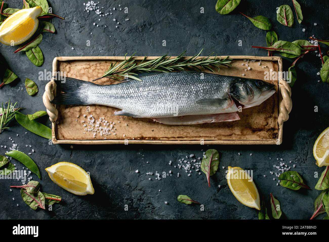 Raw uncooked fish sea bass Stock Photo - Alamy