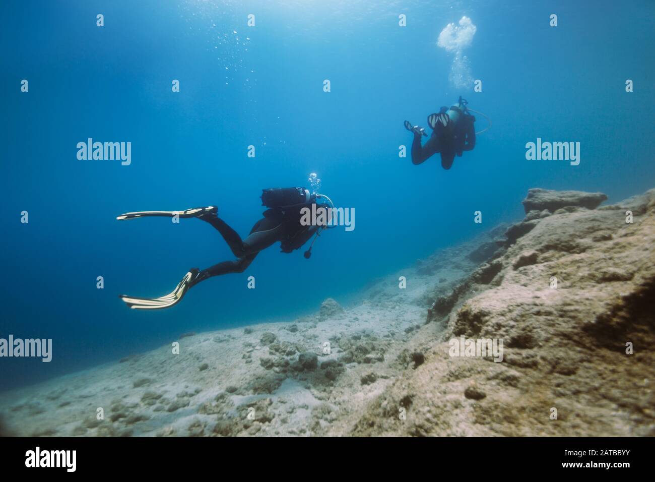 Two scuba divers underwater Stock Photo - Alamy