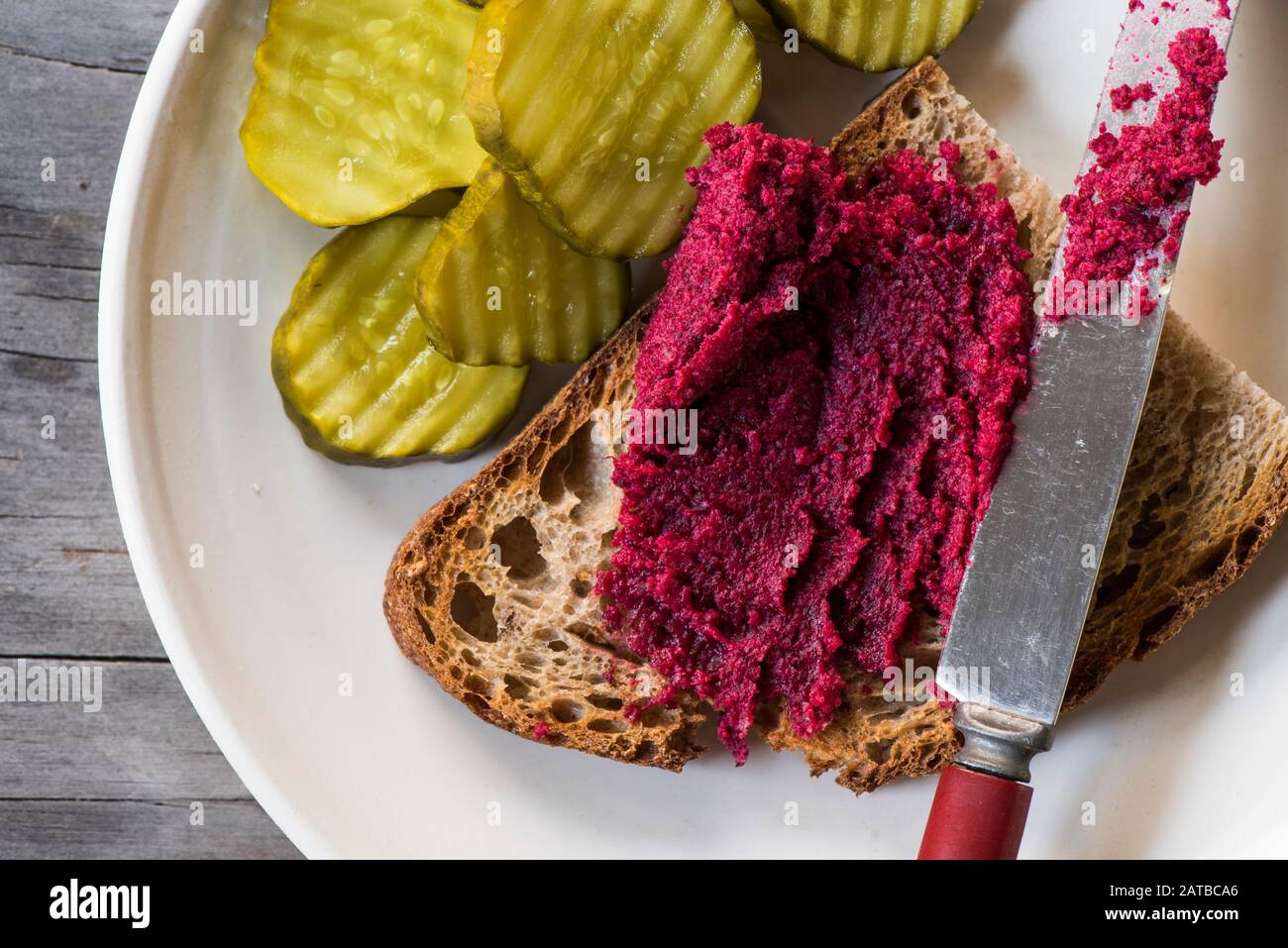 Salt-Roasted Beet Mousse on toast with pickles Stock Photo - Alamy