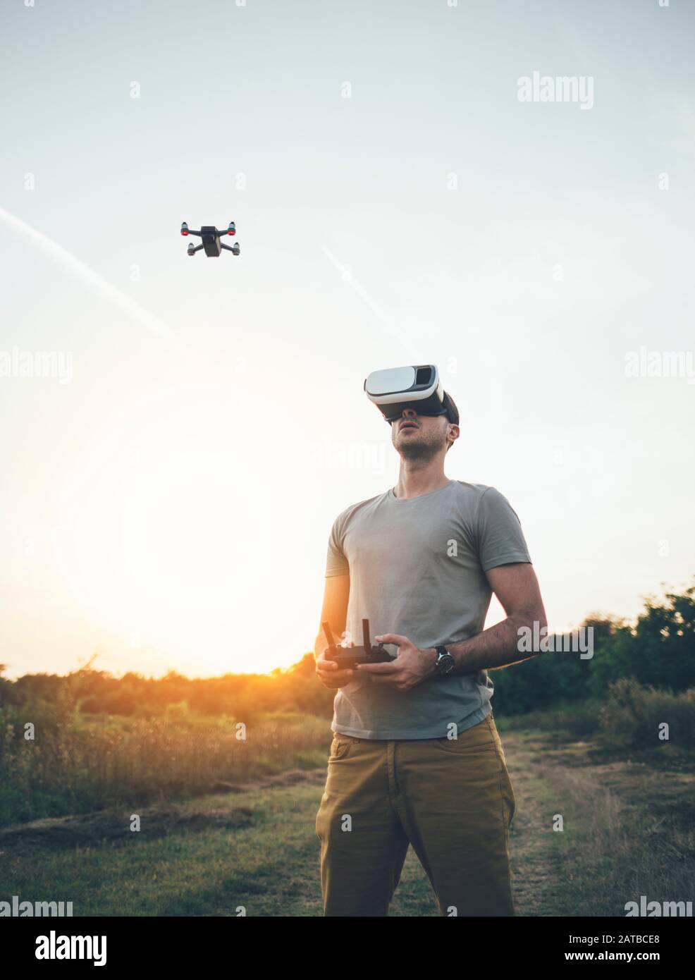 Drone pilot with virtual reality headset making photos and videos Stock ...