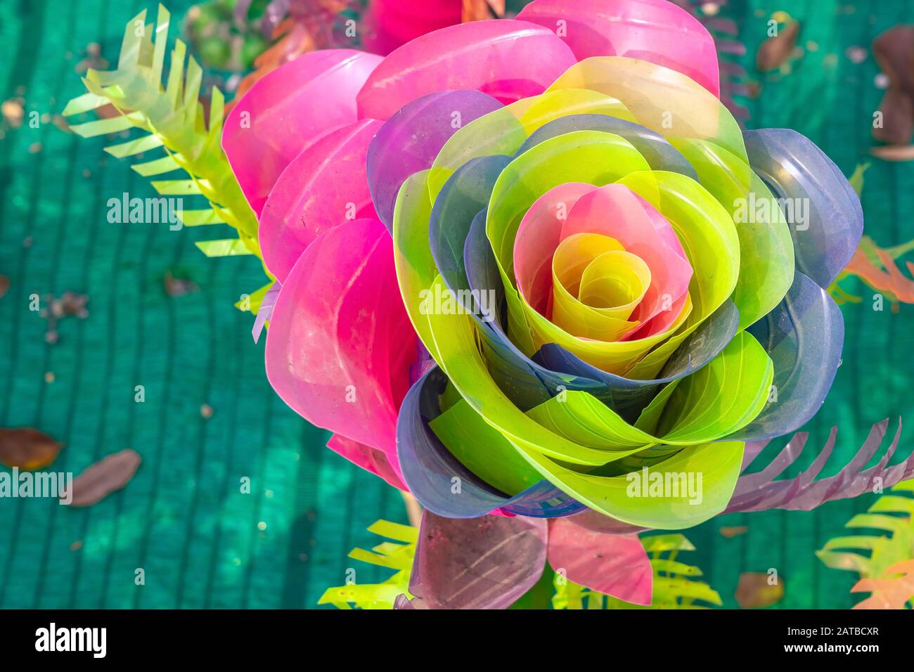 Recycled colorful plastic flowers made from plastic bottles to decorate ...