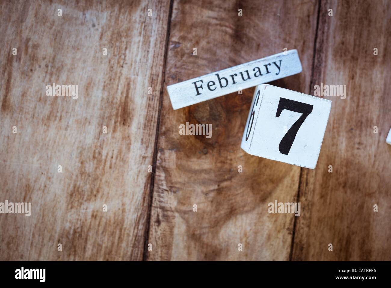 February 7th. Day 7 of February month, white calendar blocks on vintage ...