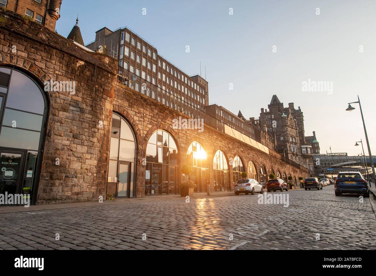 East market street of Edinburgh at sunset. Edinburgh cityscape/travel ...