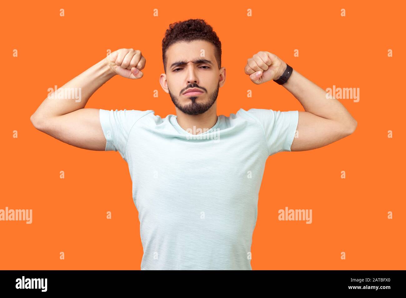 I am strong and powerful. Portrait of confident successful brunette man ...