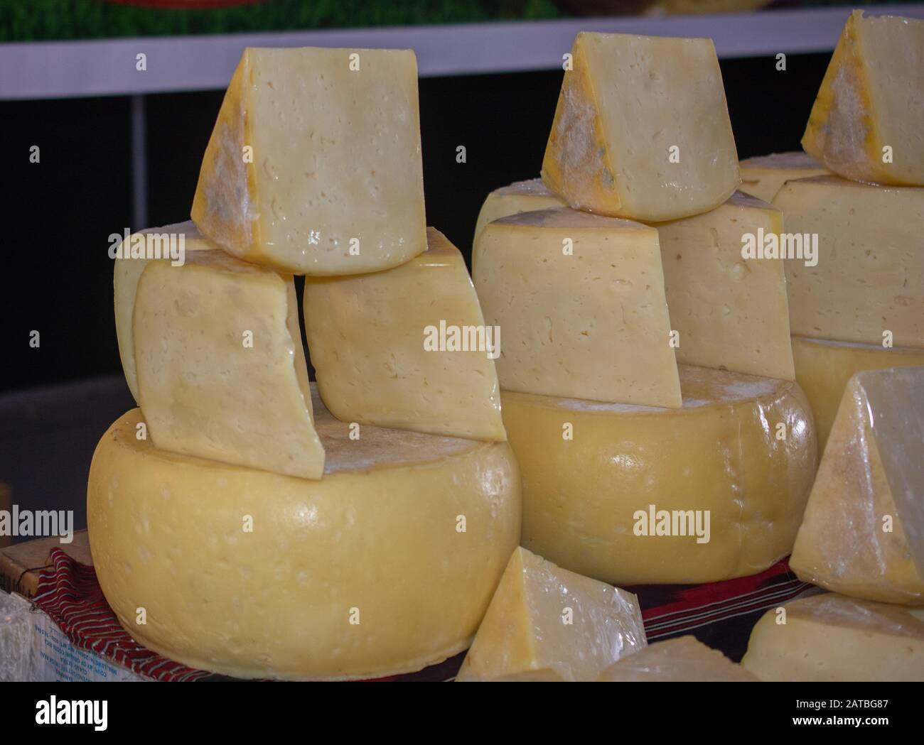 cuts of kashkaval or kasseri cheese for sale on the shelf Stock Photo ...
