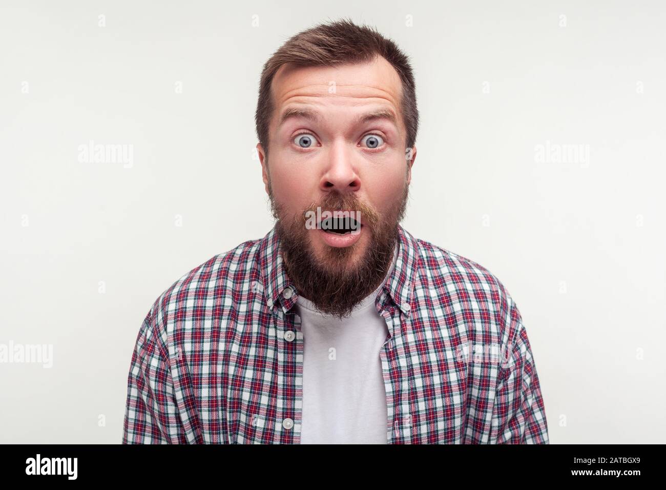 Wow, unbelievable! Portrait of shocked scared bearded man in casual ...