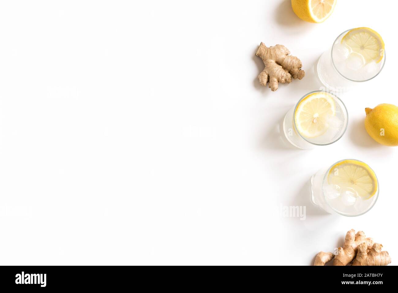 Ginger Ale Cocktail or Ginger Beer with lemon and ice isolated on white ...