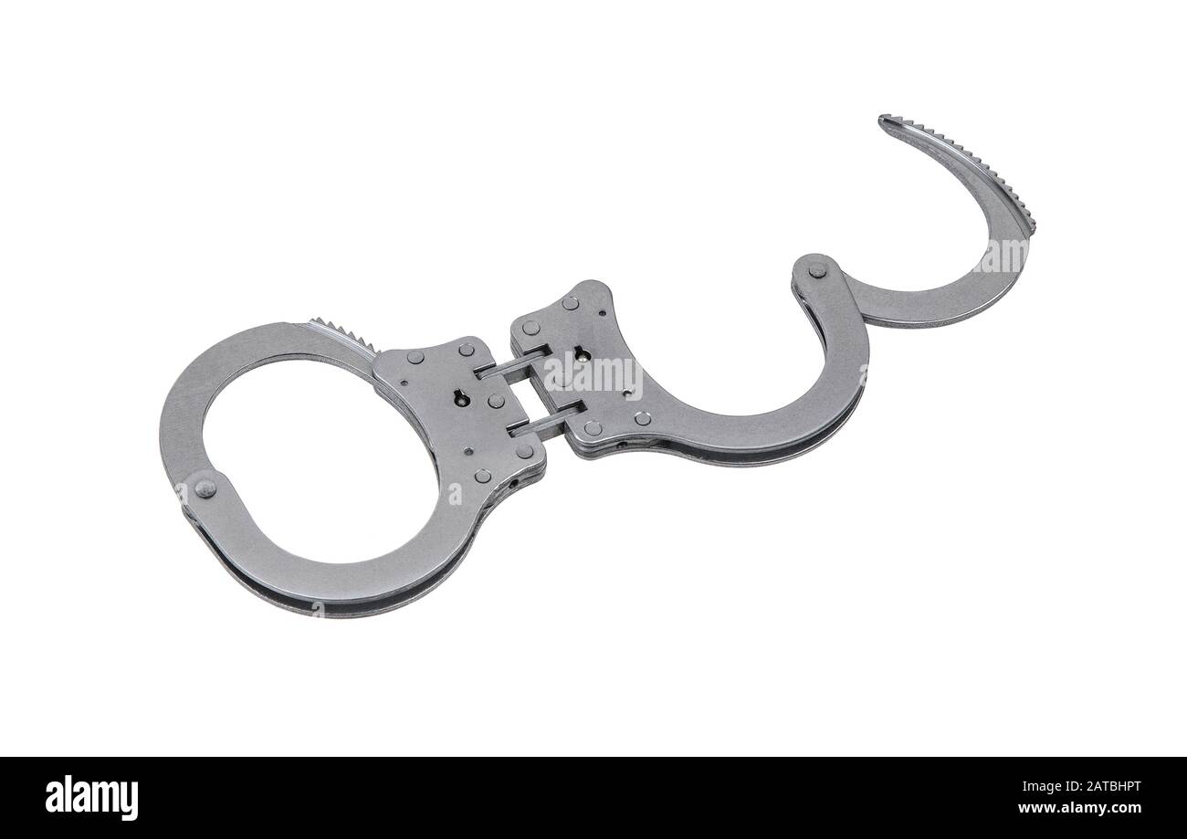 Handcuffs isolate on a white background. A pair of handcuffs on a light ...