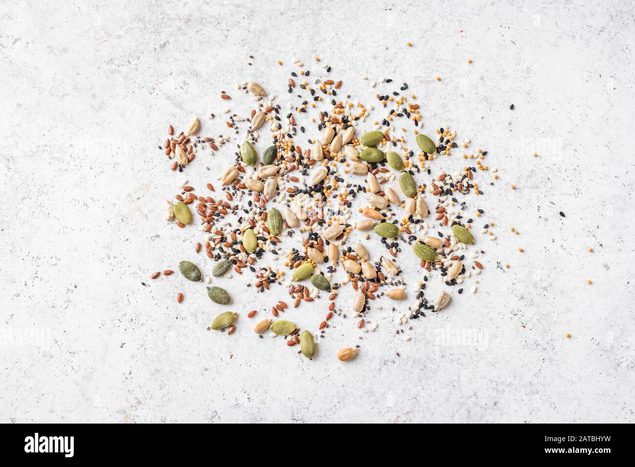 Healthy Seeds Mix for Salads and healthy dishes. Pile of mixed seeds on ...