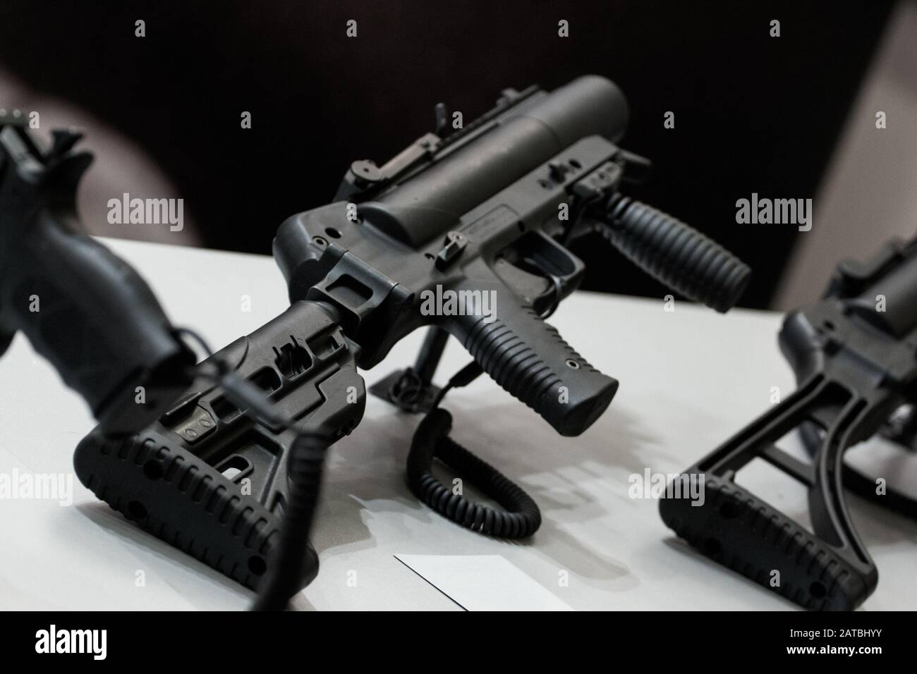 Weapon stand at an arms exhibition Stock Photo - Alamy