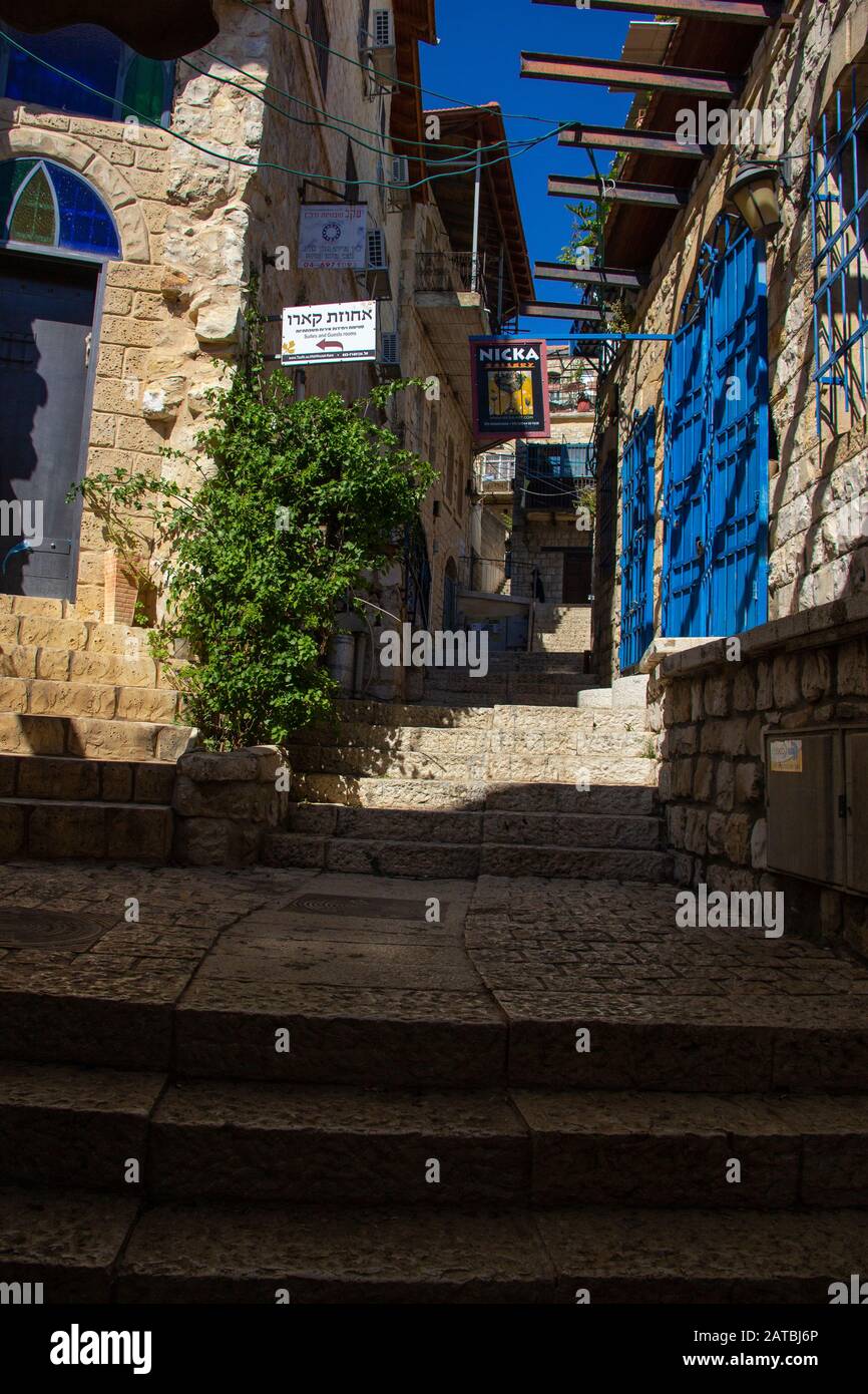Shops along a narrow lane Stock Photo - Alamy