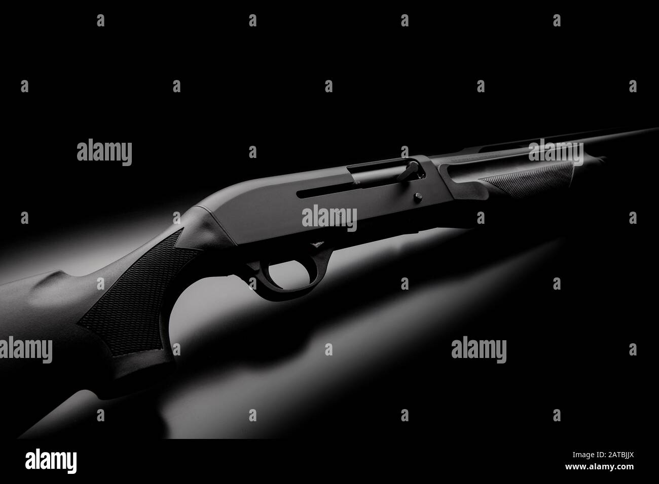 Modern semi-automatic shotgun on black background. Modern weapons on a ...