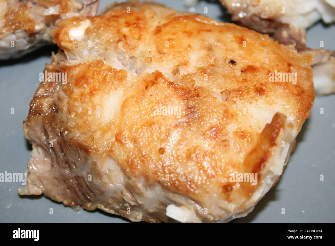 Nile perch steak fried close-up Stock Photo - Alamy
