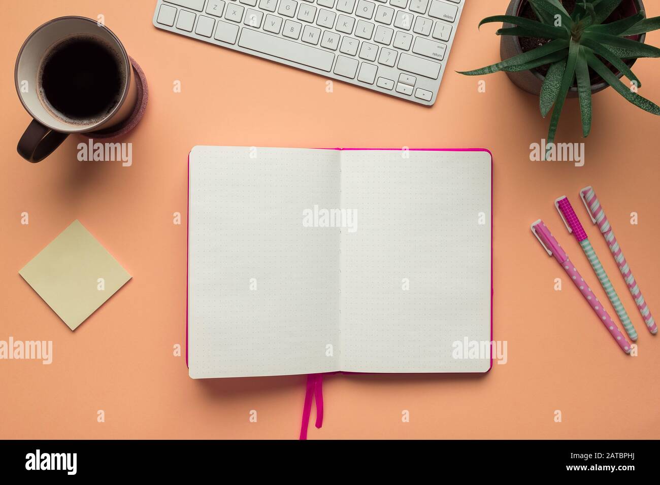 Stock photo of a blank open notebook page in the middle of office desk ...