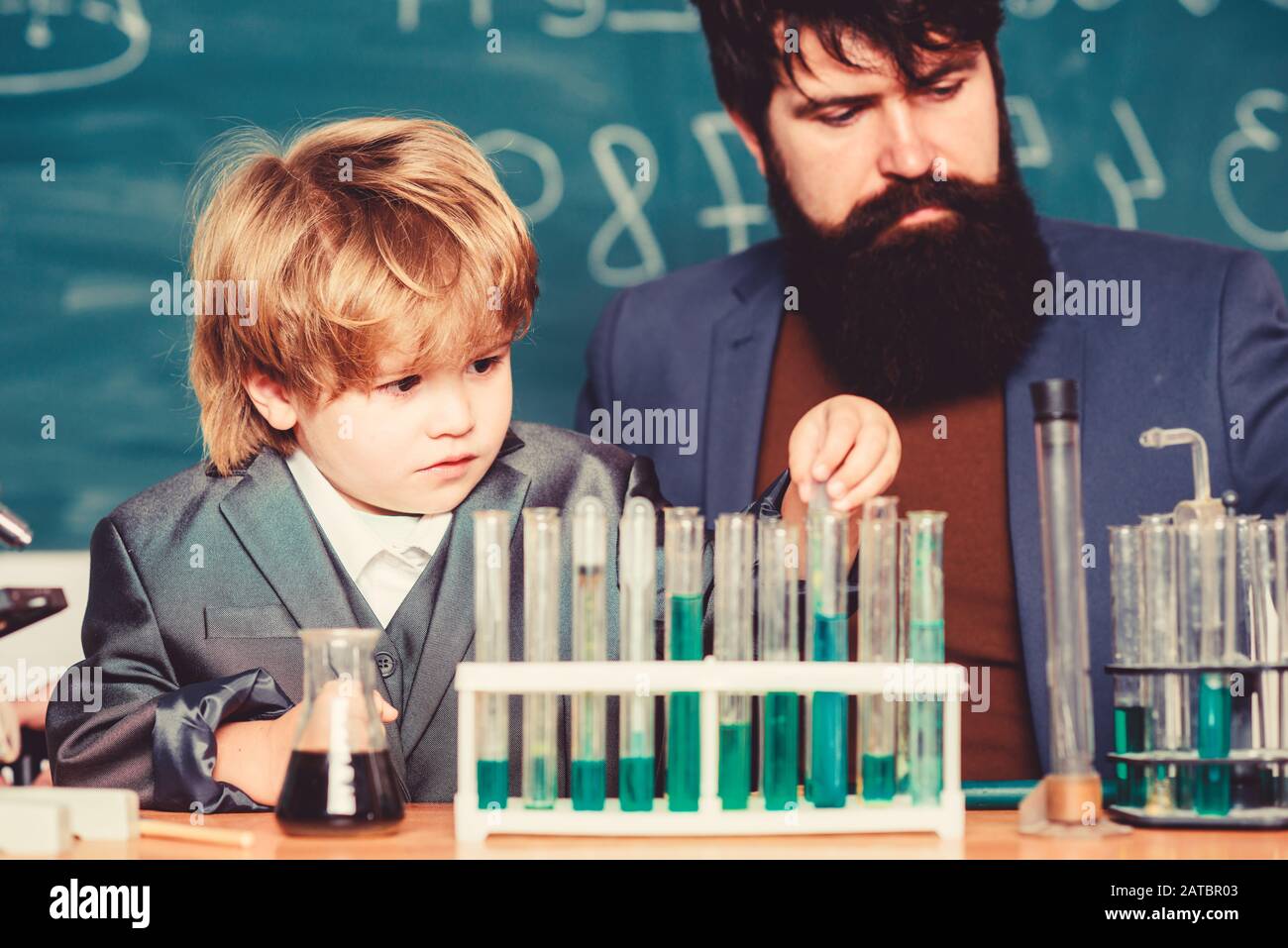 teacher man with little boy. Biology Science lab. father and son at ...