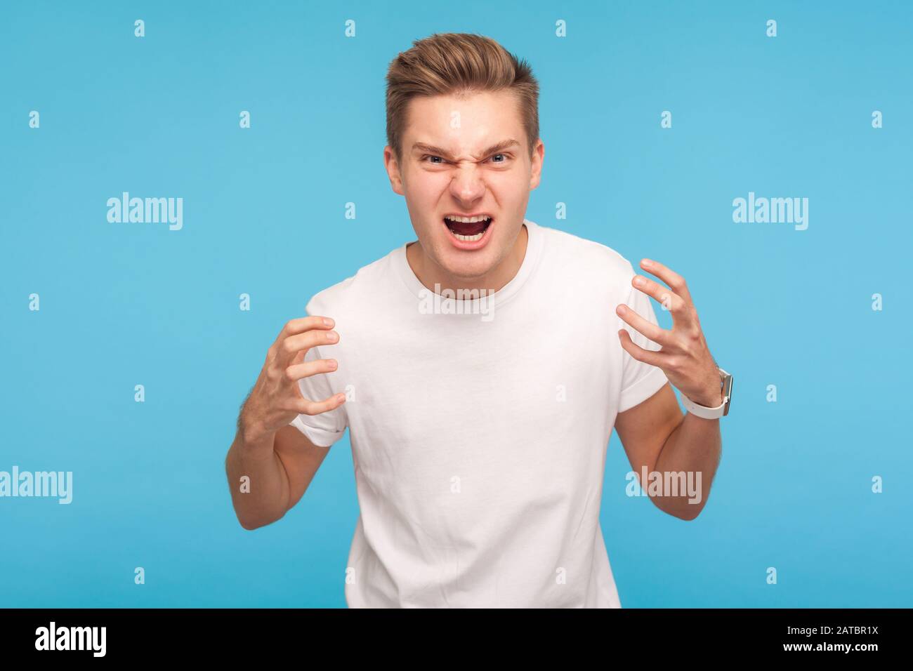 Angry man showing teeth hi-res stock photography and images - Alamy
