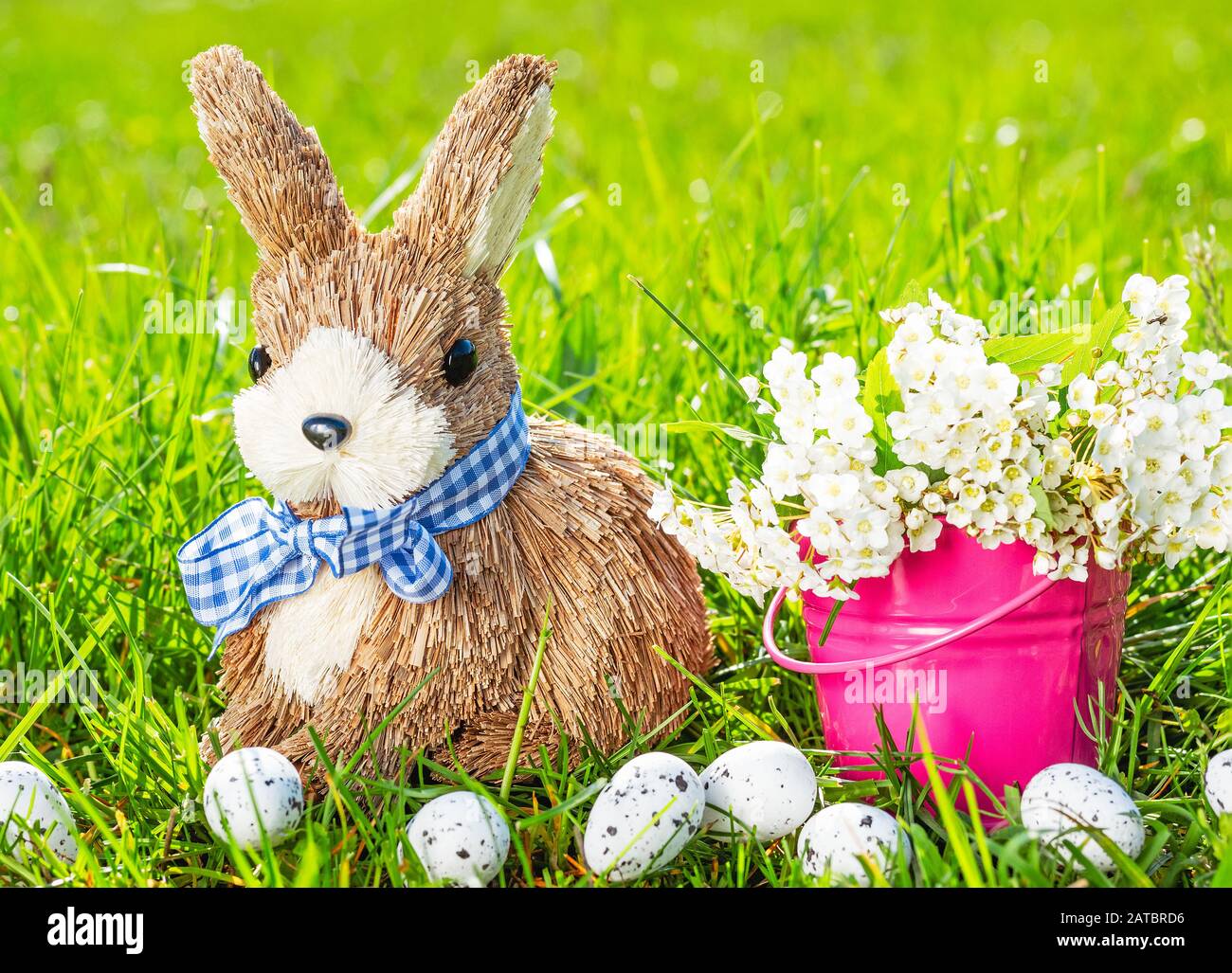 Easter background with rabbit, eggs, green grass and flowers Stock ...