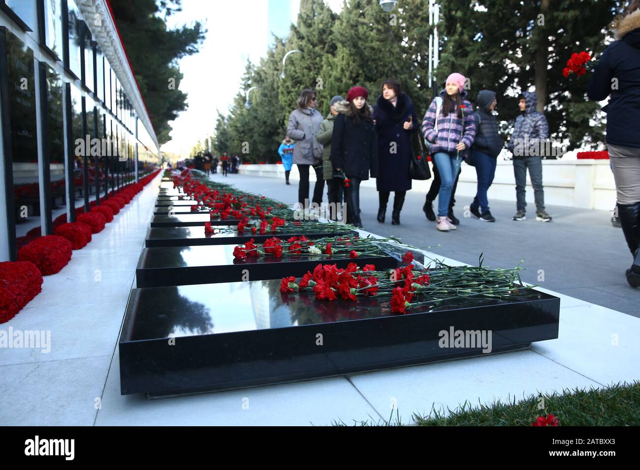 People visiting Alley of Martyrs on anniversary of 20th January tragedy ...