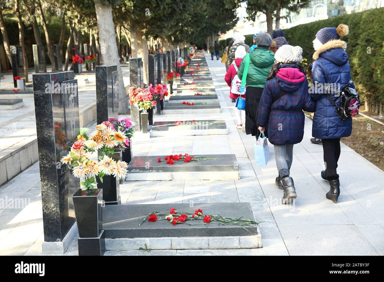 People visiting Alley of Martyrs on anniversary of 20th January tragedy ...