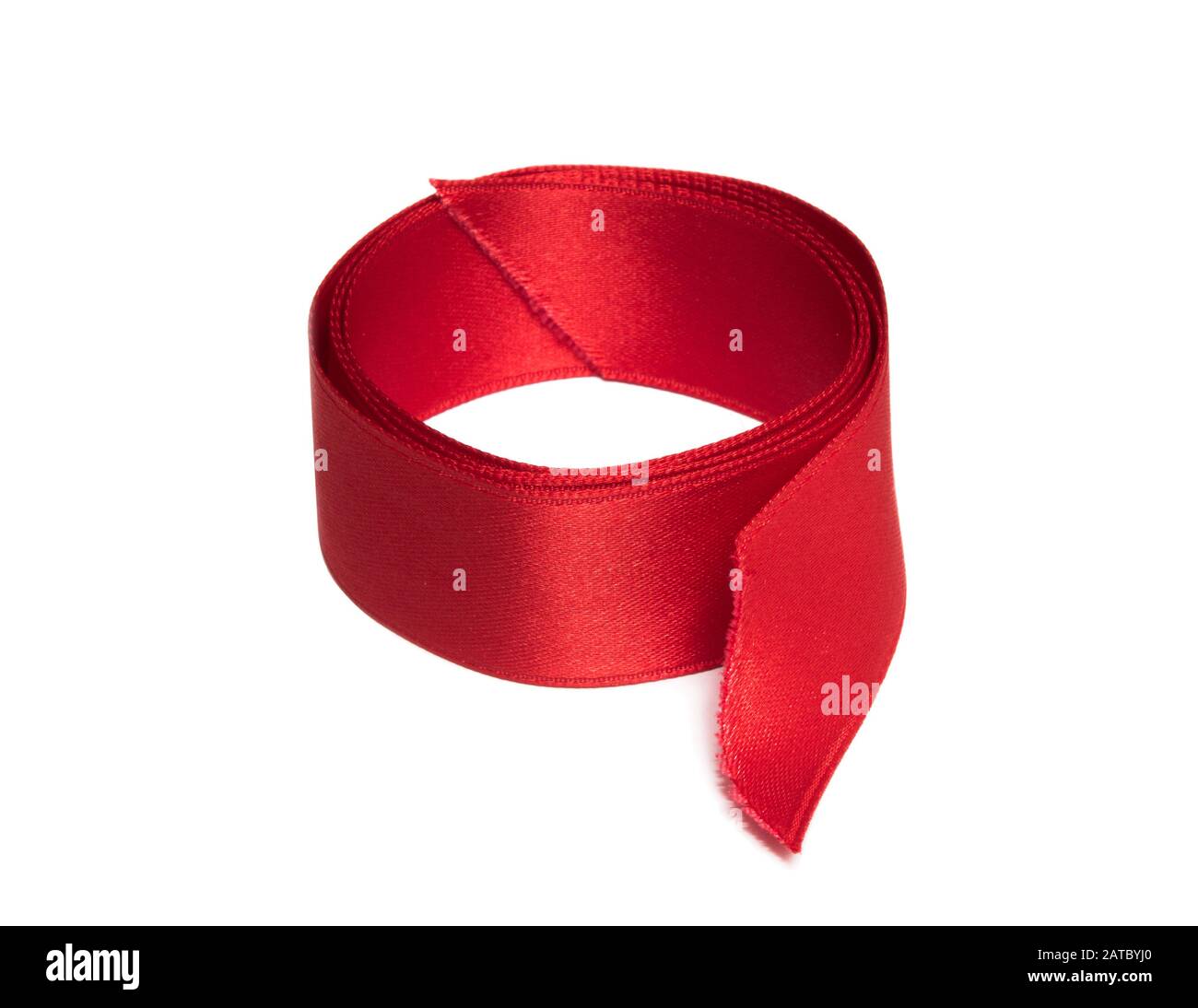 simply red ribbon roll on white background Stock Photo - Alamy