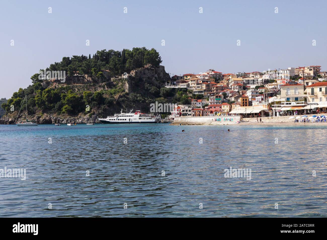 The Venetian Castle of Parga Town acts as a backdrop to the beautiful ...