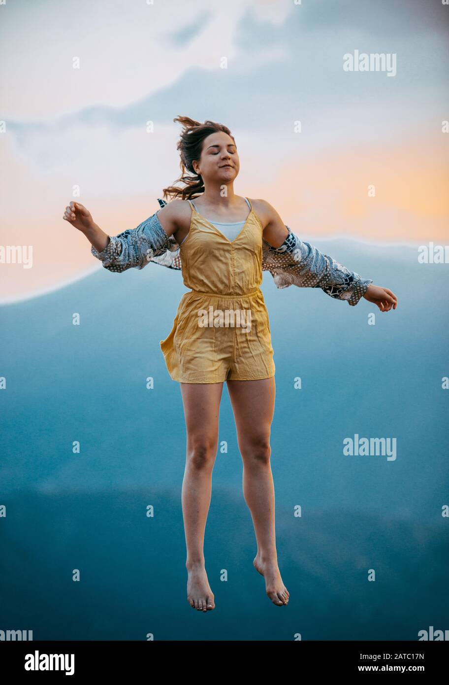 Woman making dance jump hi-res stock photography and images - Alamy