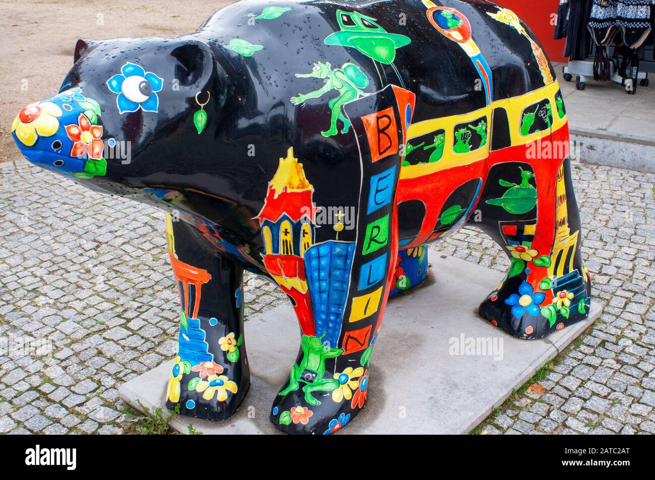A painted bear figure under the television tower in Berlin, Germany ...