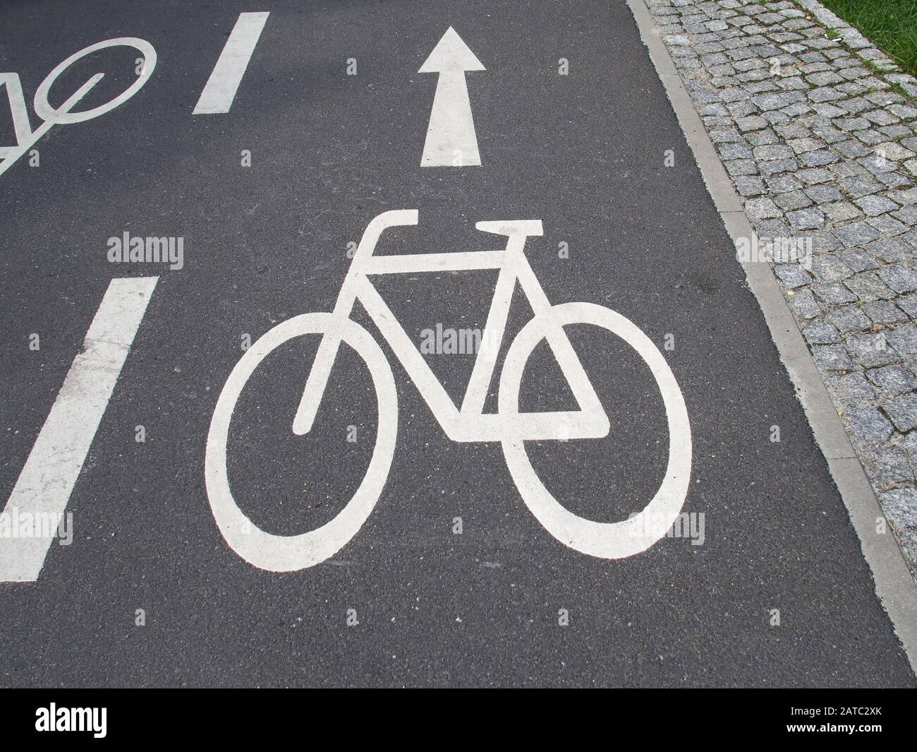 Traffic Sign: Bicycle Symbol On A Wet Asphalt Bikeway In Berlin ...