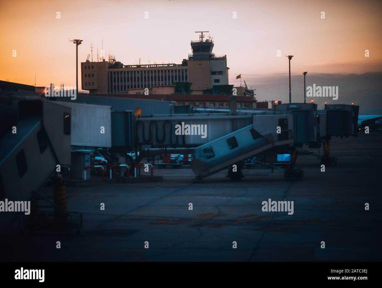 Several jet bridges used for boarding passengers into an airplanes ...