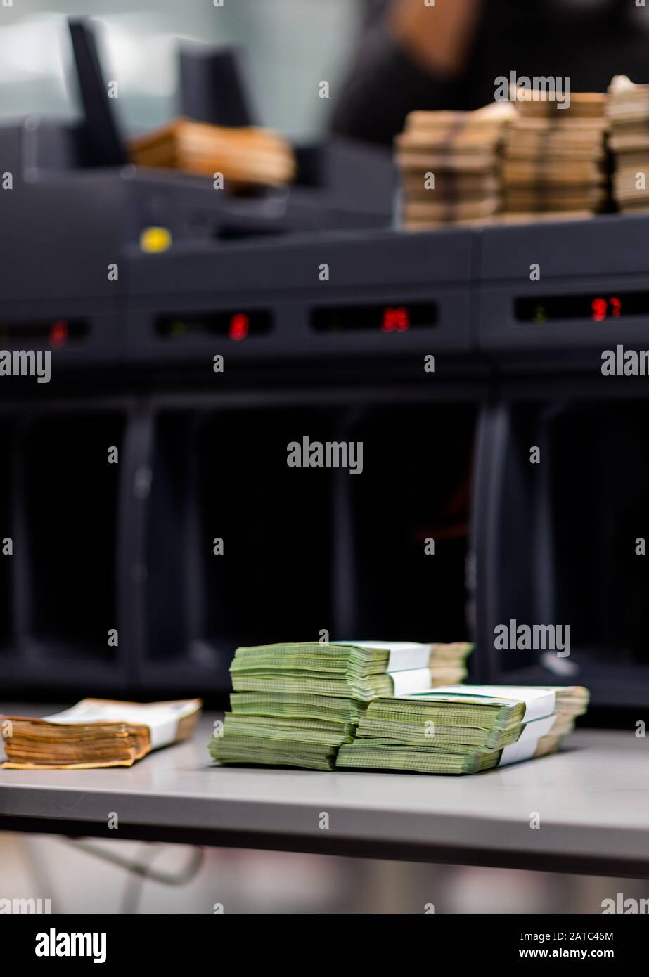 Euro € banknotes stacked and binded together with currency bands in ...