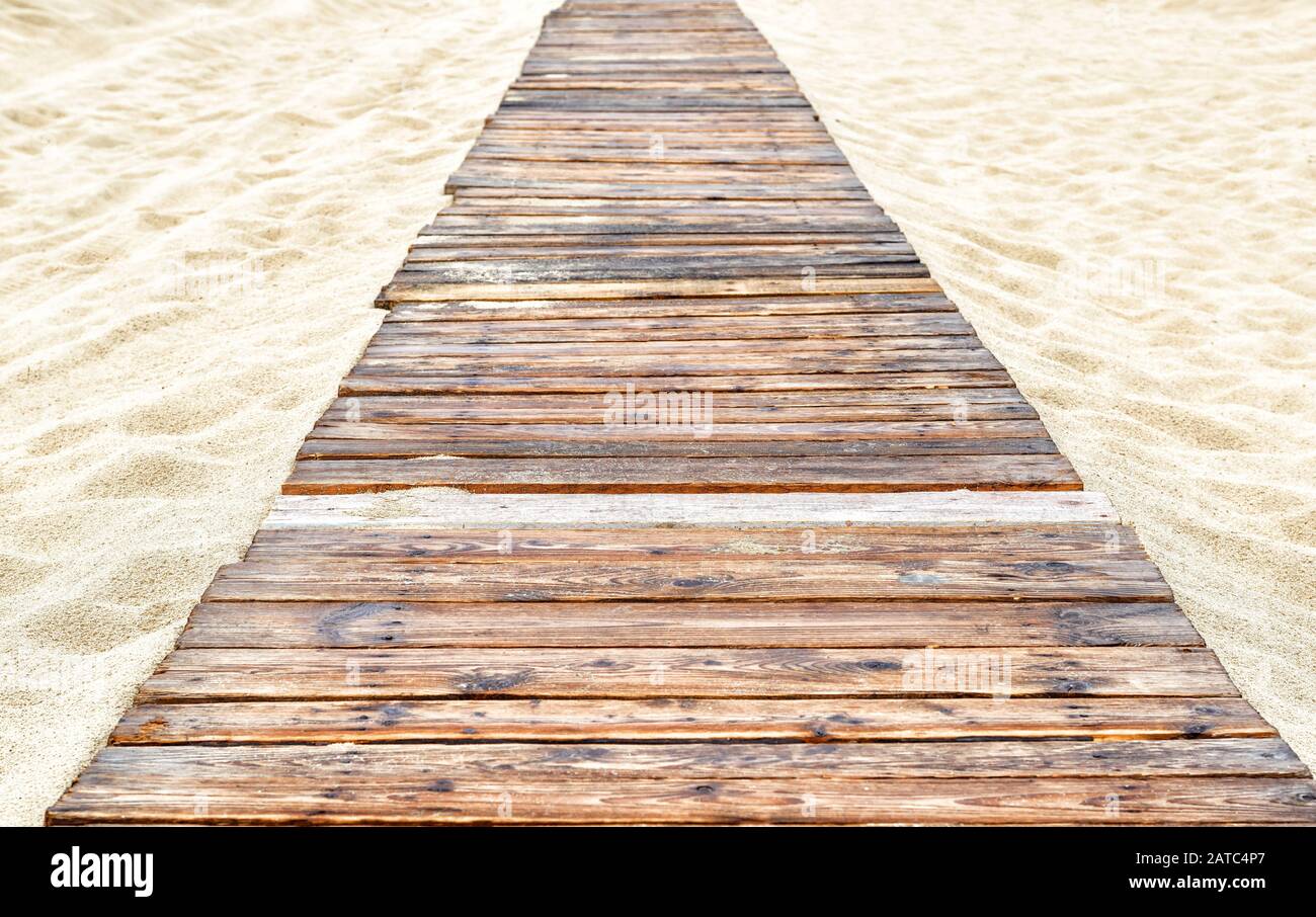 Panorama of deserted sandy beach with a wooden pathway in Anapa, Russia ...