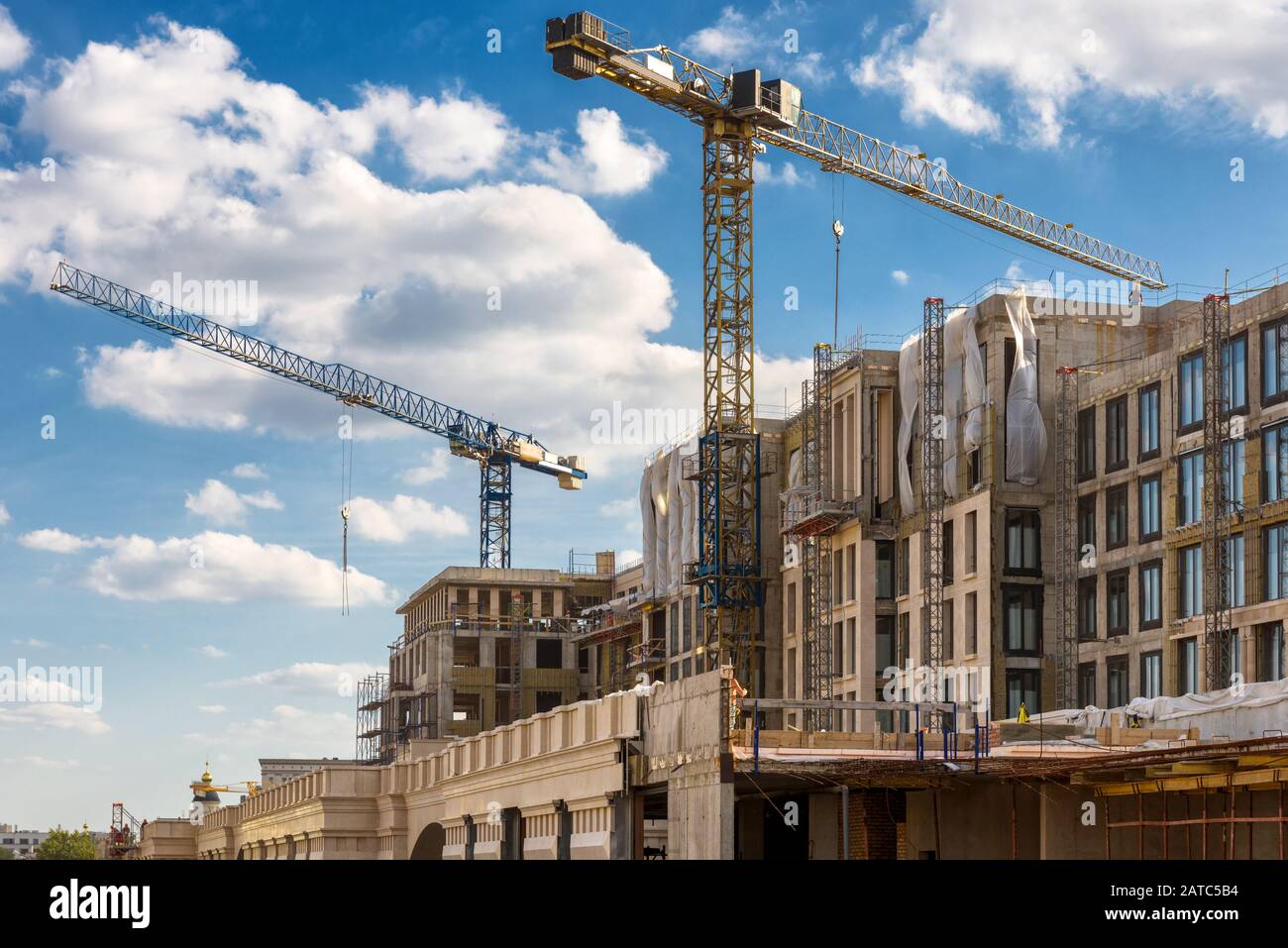 Construction site with tower cranes in Moscow, Russia. Panorama of ...