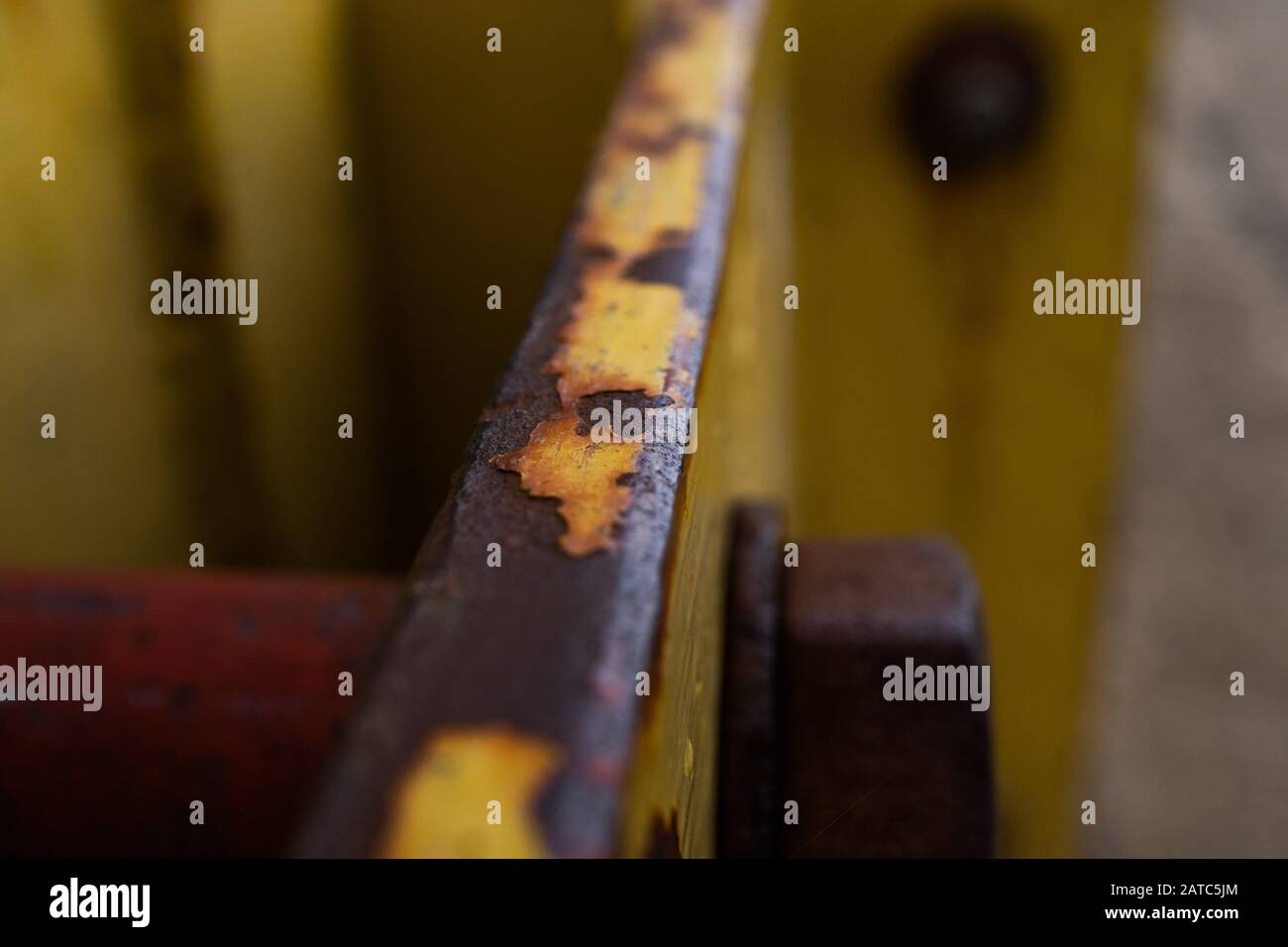 old rusty yellow steel platte Stock Photo - Alamy