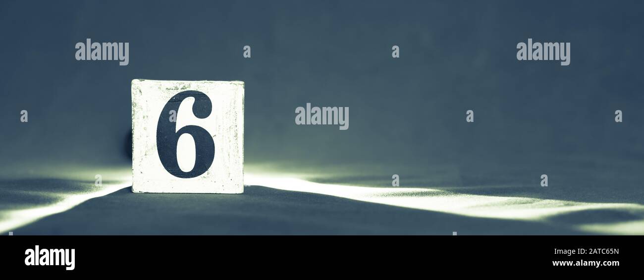 Old rustic block with number 6, six Stock Photo - Alamy