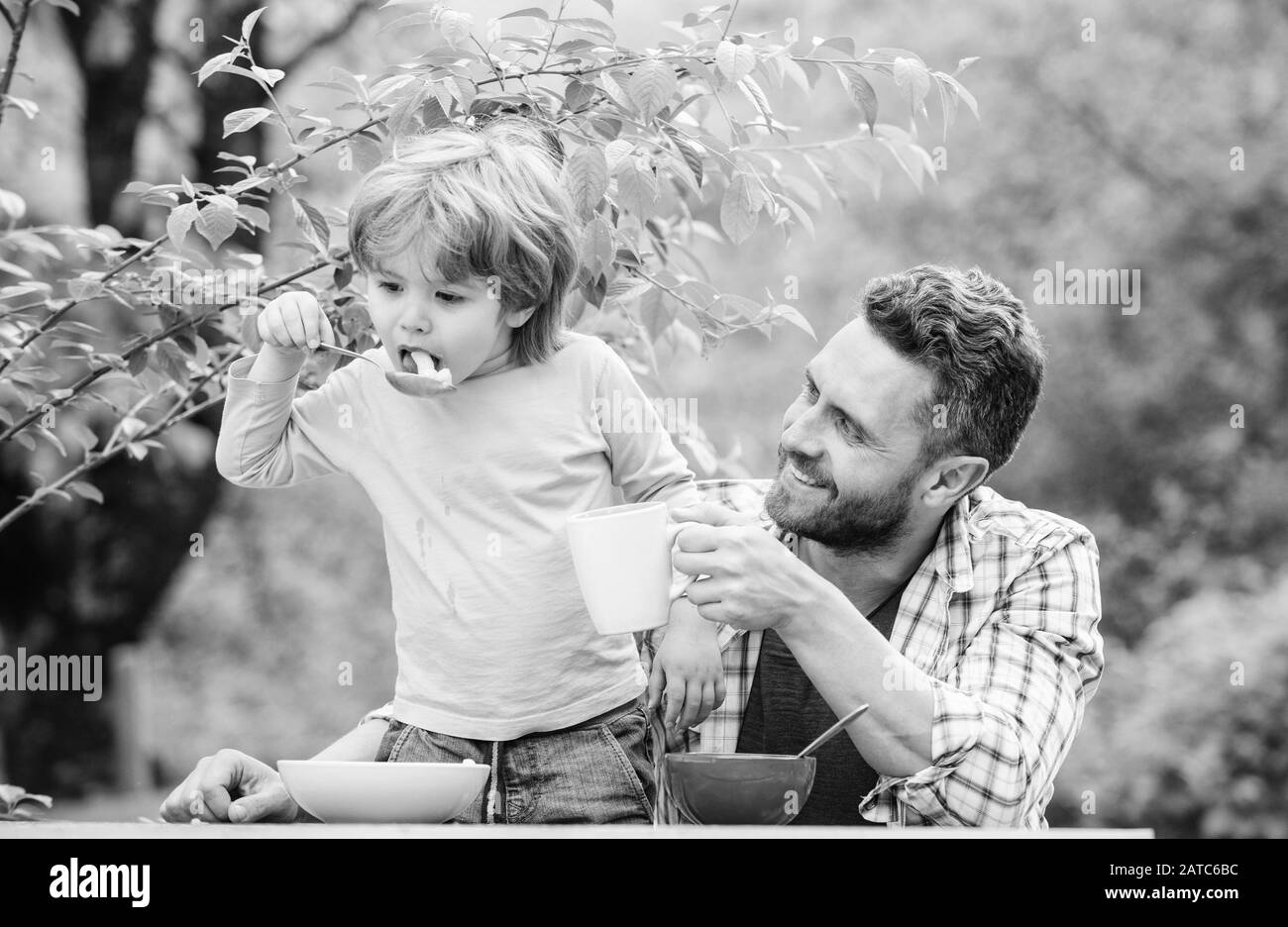 Father son eat food and have fun. Menu for children. Family enjoy ...