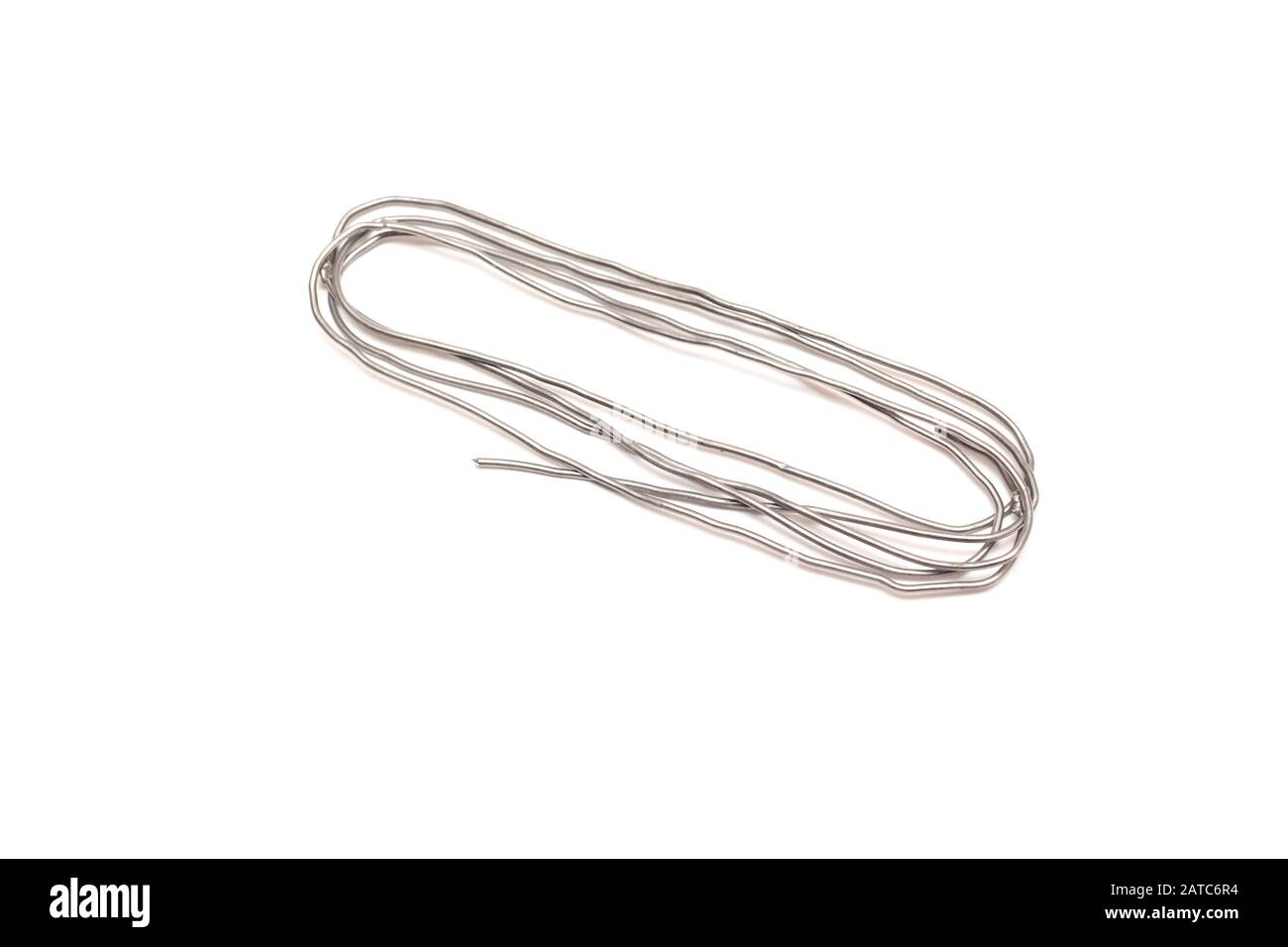 Twisted skein of wire closeup isolated on white background Stock Photo ...