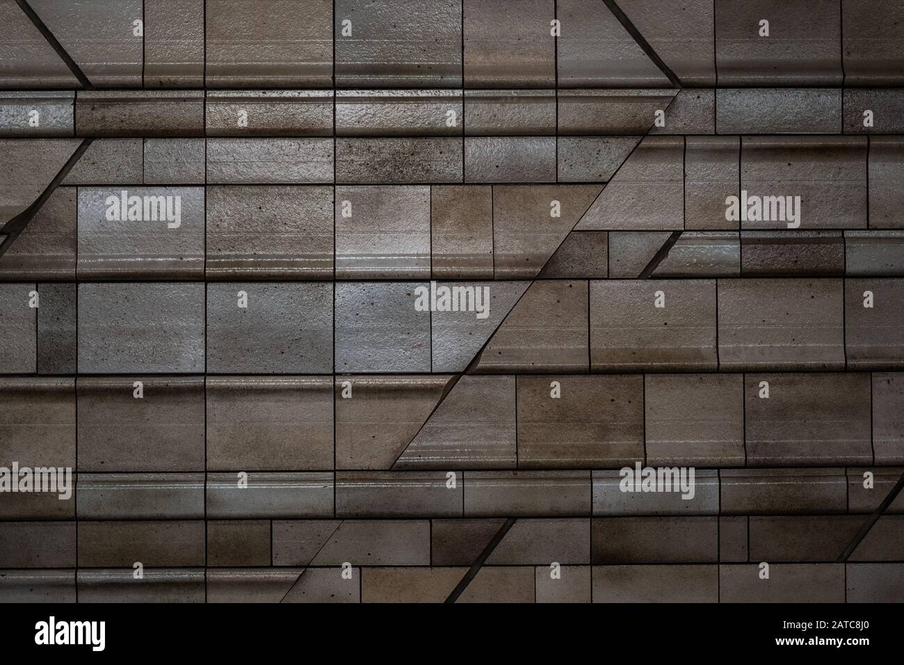 tiles on a wall with great structure and texture, old tiles in a metro ...